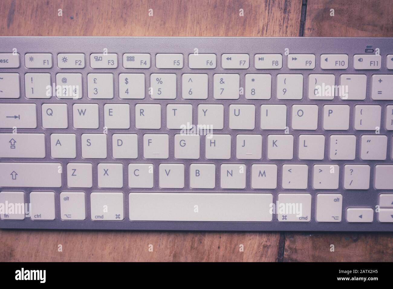 Portable wireless computer keyboard. Vintage style image Stock Photo ...