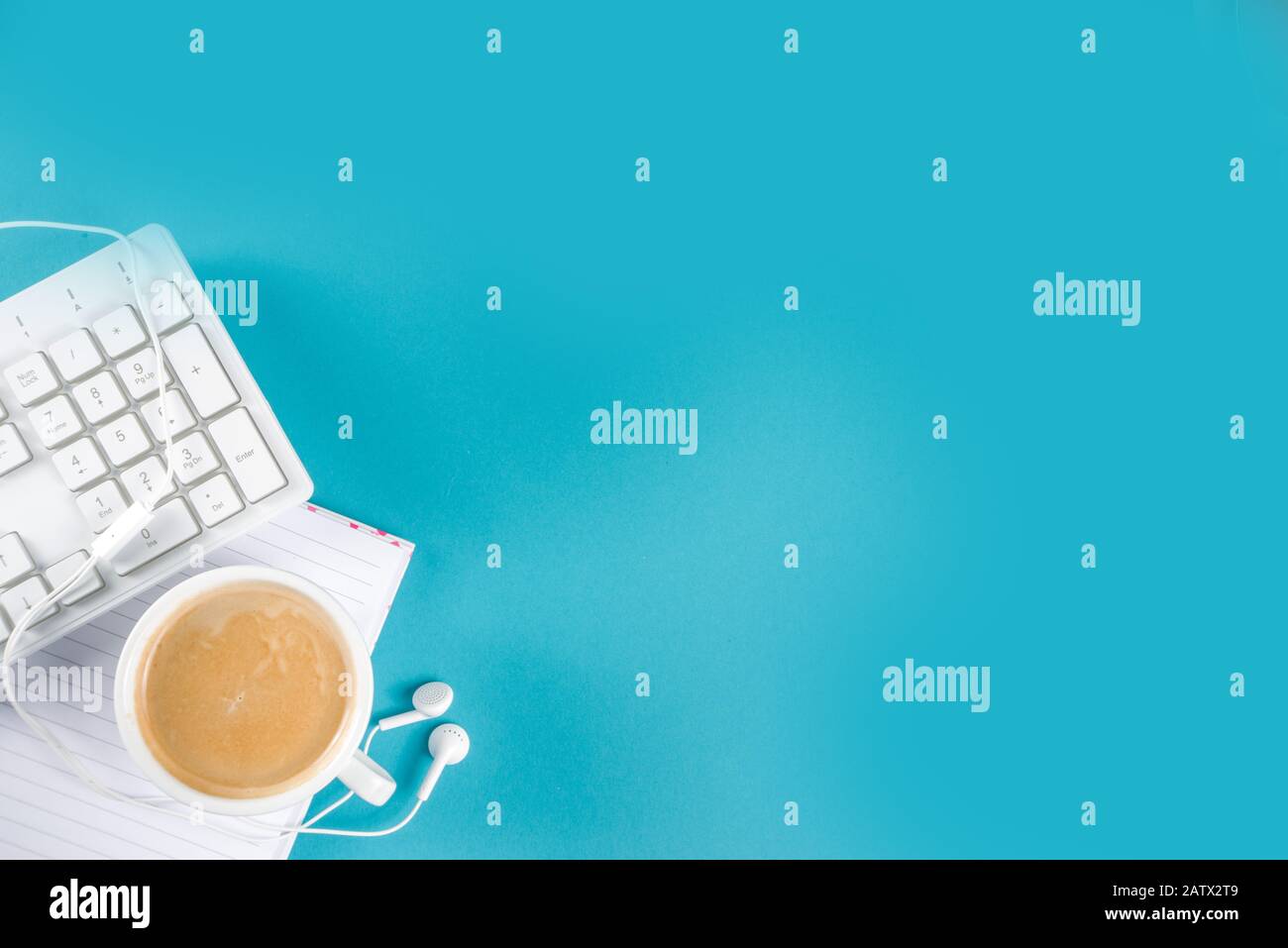 Office aquamarine, turquoise blue workplace backdrop with coffee cup ...