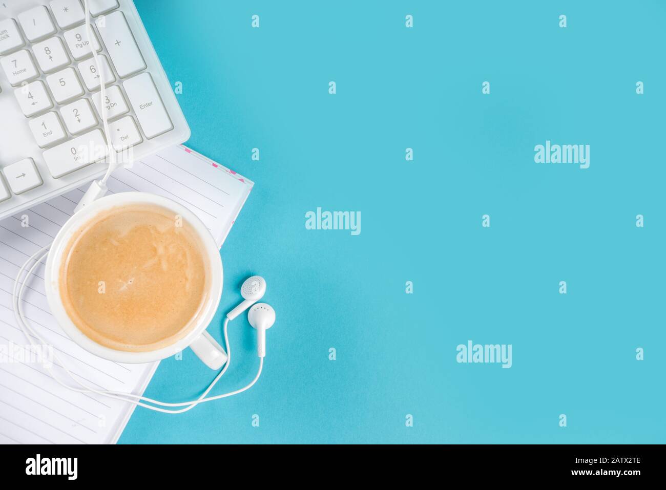 Office aquamarine, turquoise blue workplace backdrop with coffee cup ...