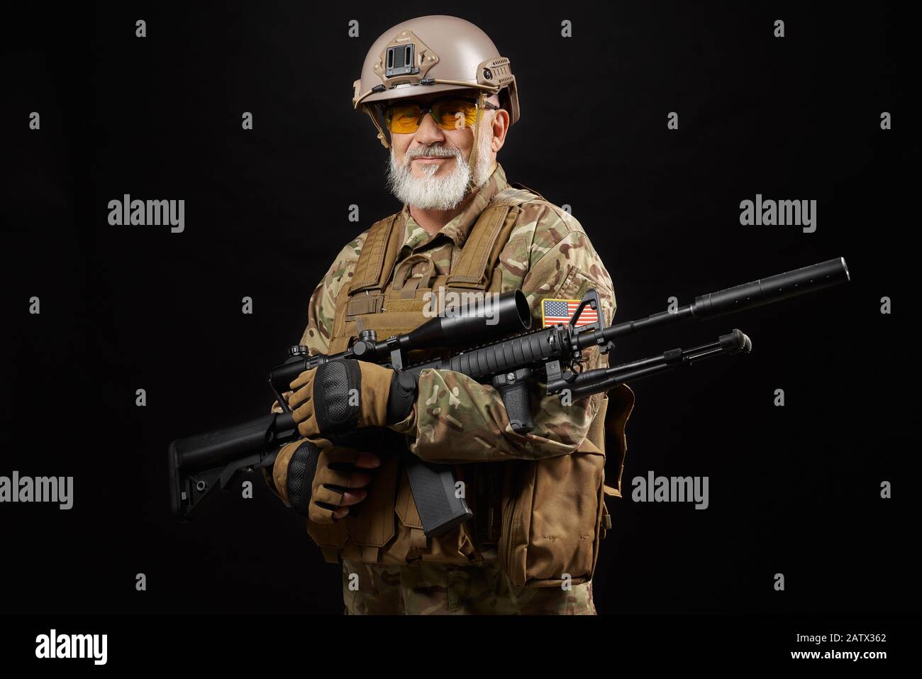 Standing holding looking at camera smiling weapon military uniform hi ...