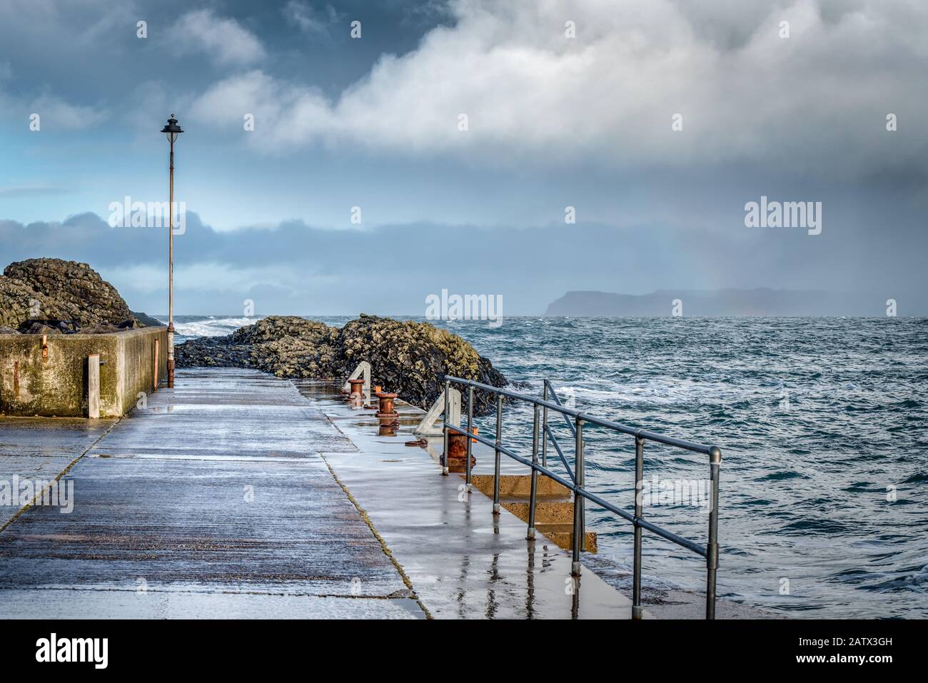 This is the small pier at Ballintoy harbour on the North Antrim Coast ...