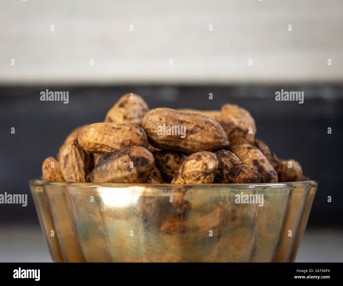 Steamed peanuts in a glass bowl. Groundnuts unpeeled in a bowl Stock ...