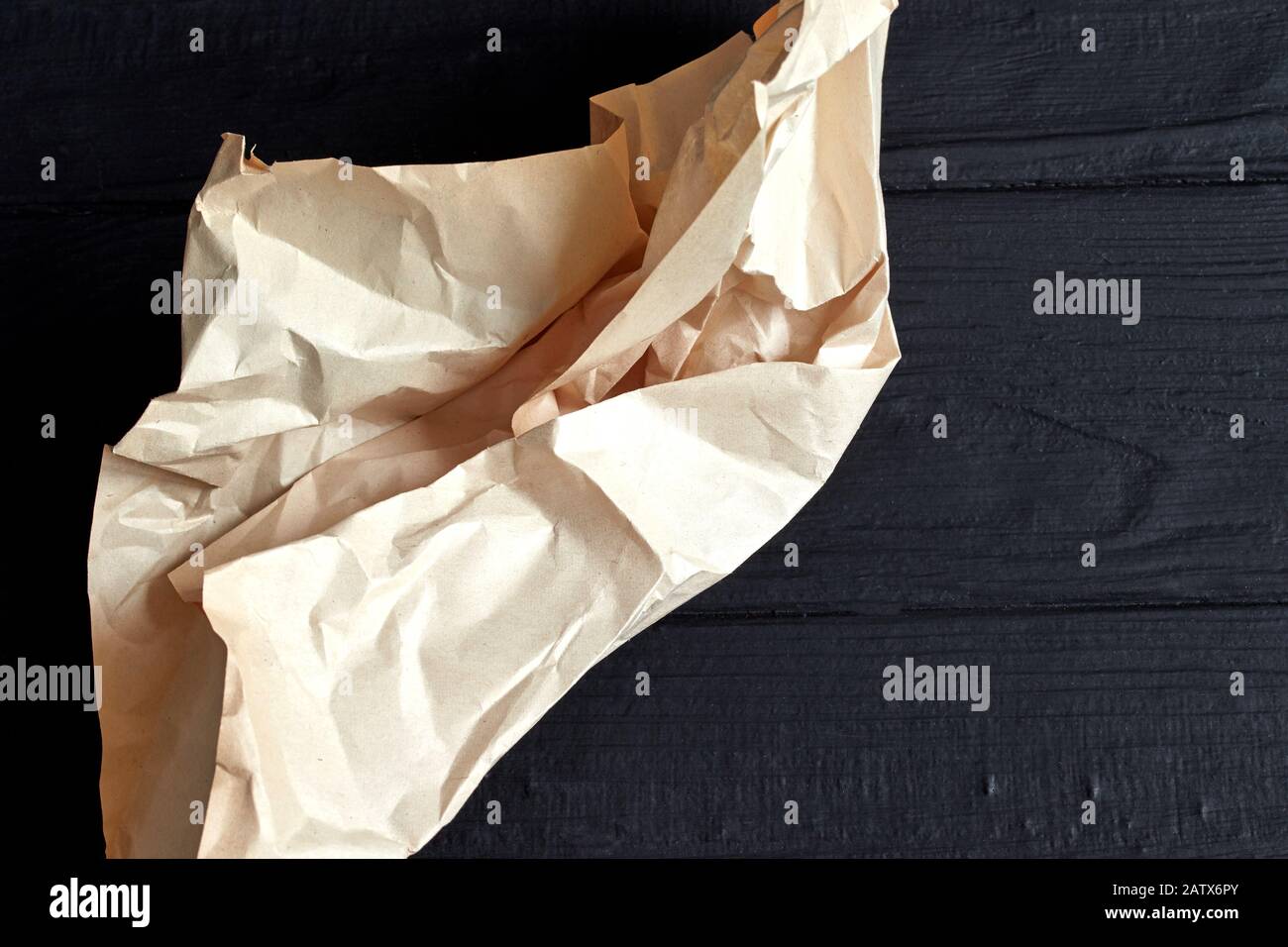 Black folded paper rough hi-res stock photography and images - Alamy
