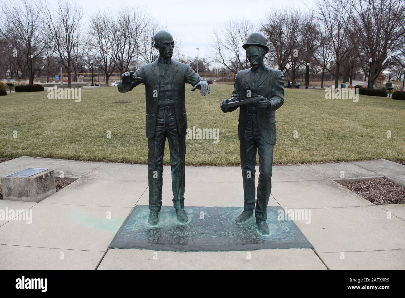Wright Brothers Statue shows Wilbur explaining "wing warping" to ...