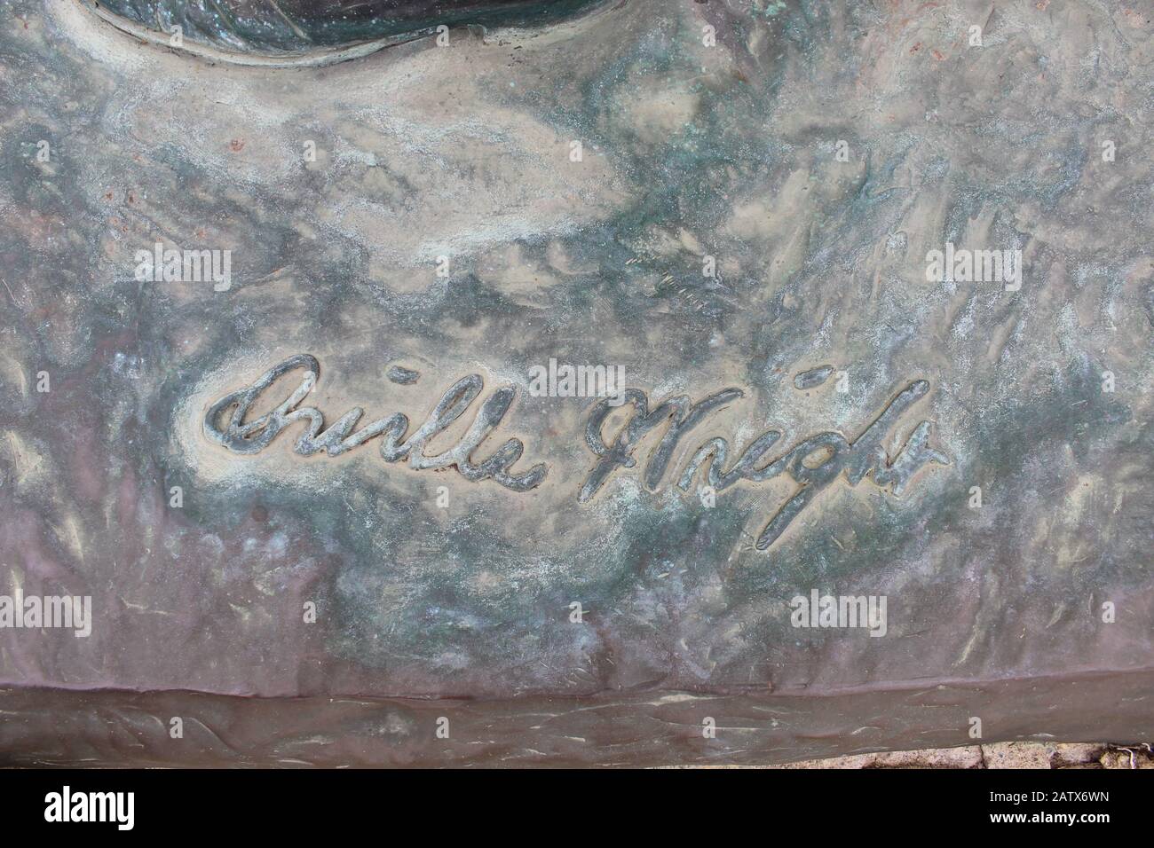 Wright Brothers Statue shows Wilbur explaining "wing warping" to ...