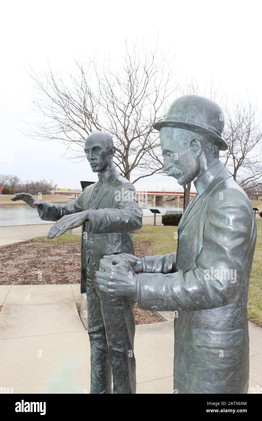 Wright Brothers Statue shows Wilbur explaining "wing warping" to ...
