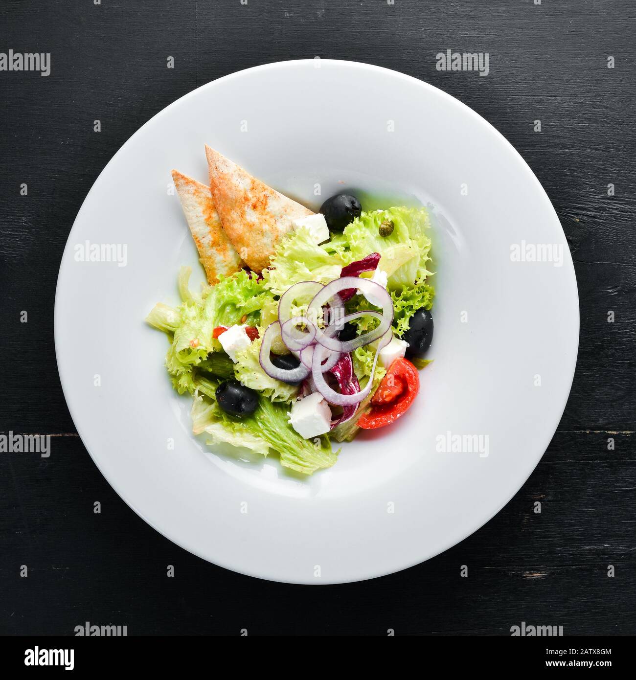 Greek Salad Vegetable Salad With Feta Cheese Olives And Cherry Tomatoes In The Plate Top
