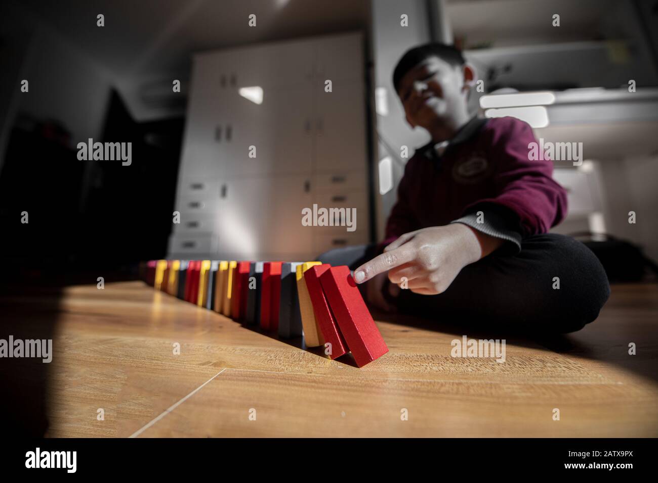 Boy falling desk hi-res stock photography and images - Alamy
