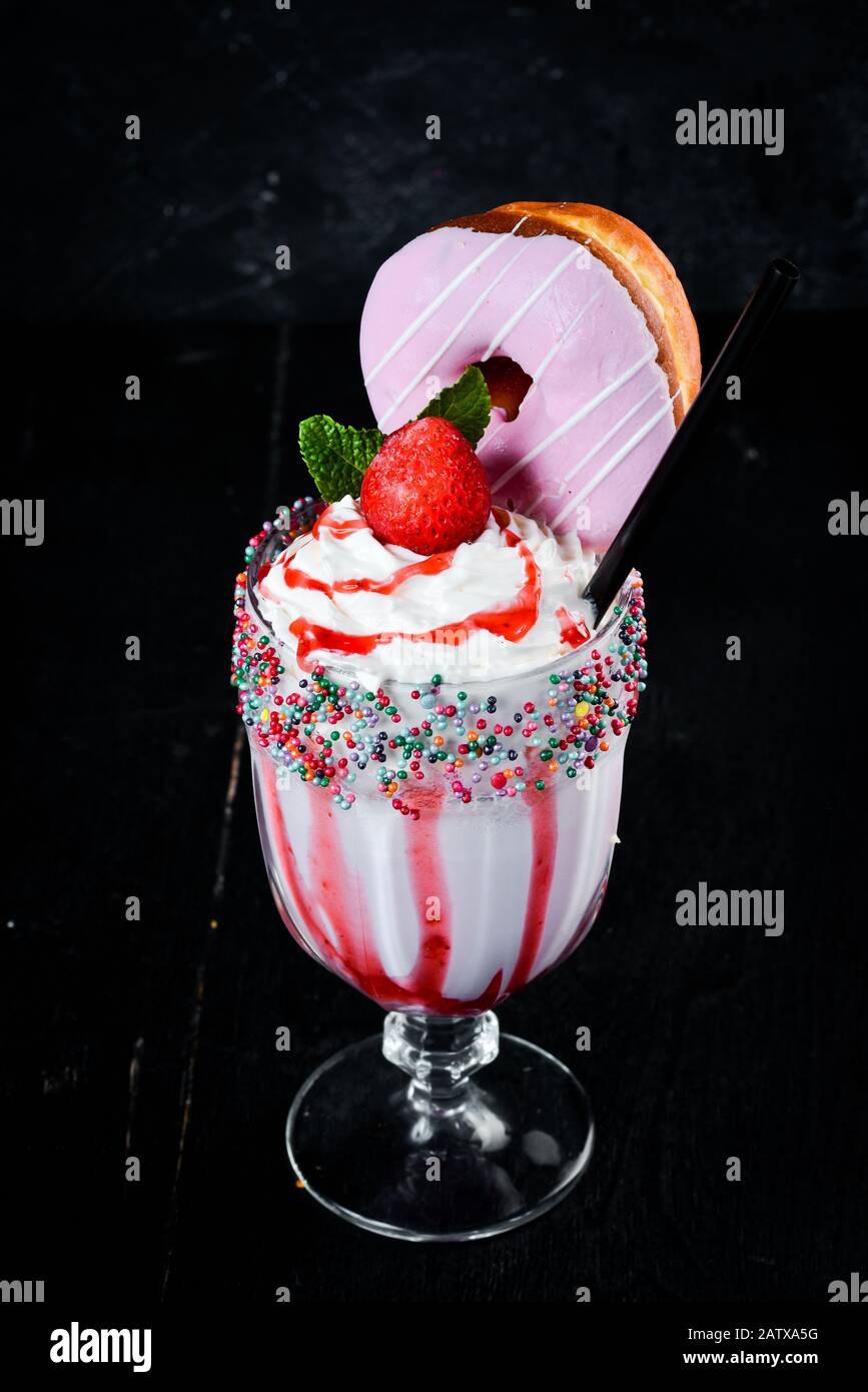 Milk shake with Donat. Top view. Free space for your text. Rustic style ...