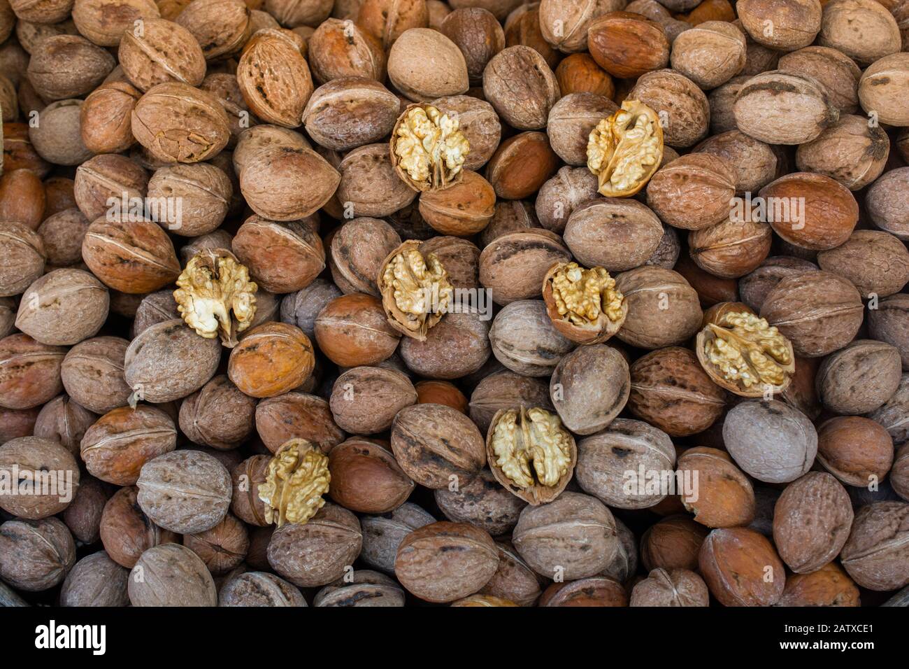 Whole walnuts background. Healthy organic food concept Stock Photo - Alamy