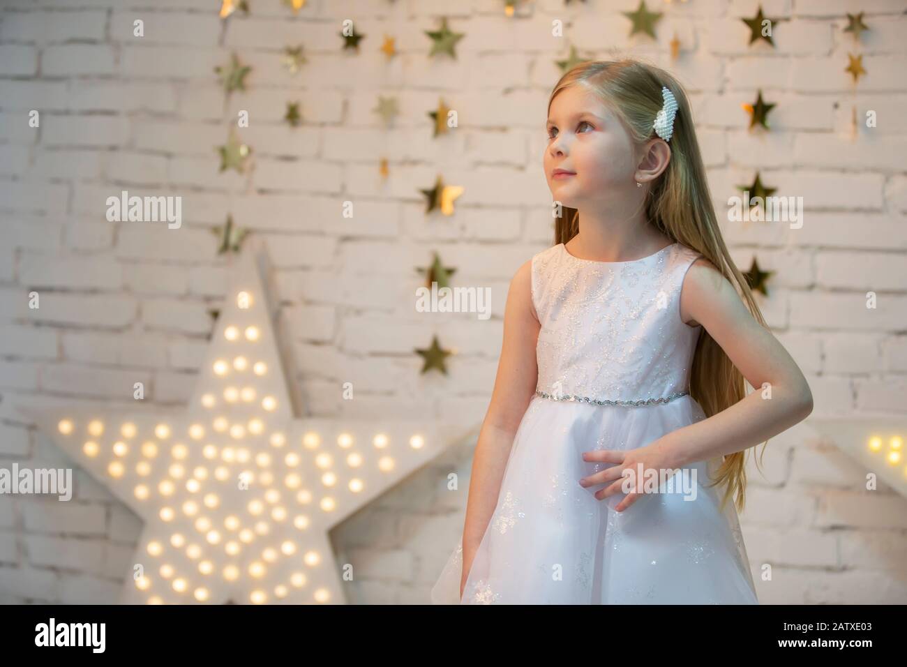 Portrait of a beautiful baby girl. The face of a five year old child ...