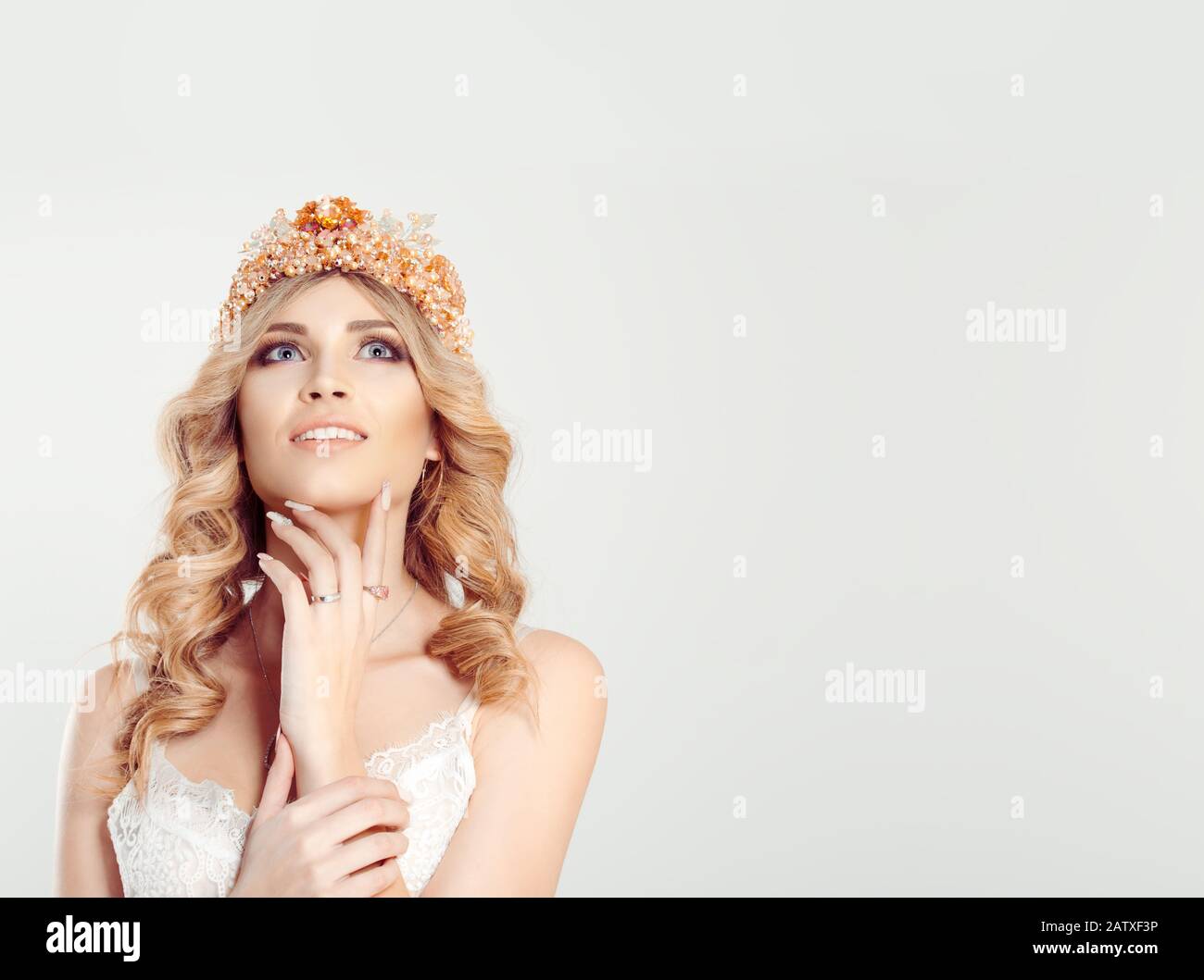 Beauty queen actress miss looking up puzzled thinking Closeup portrait ...