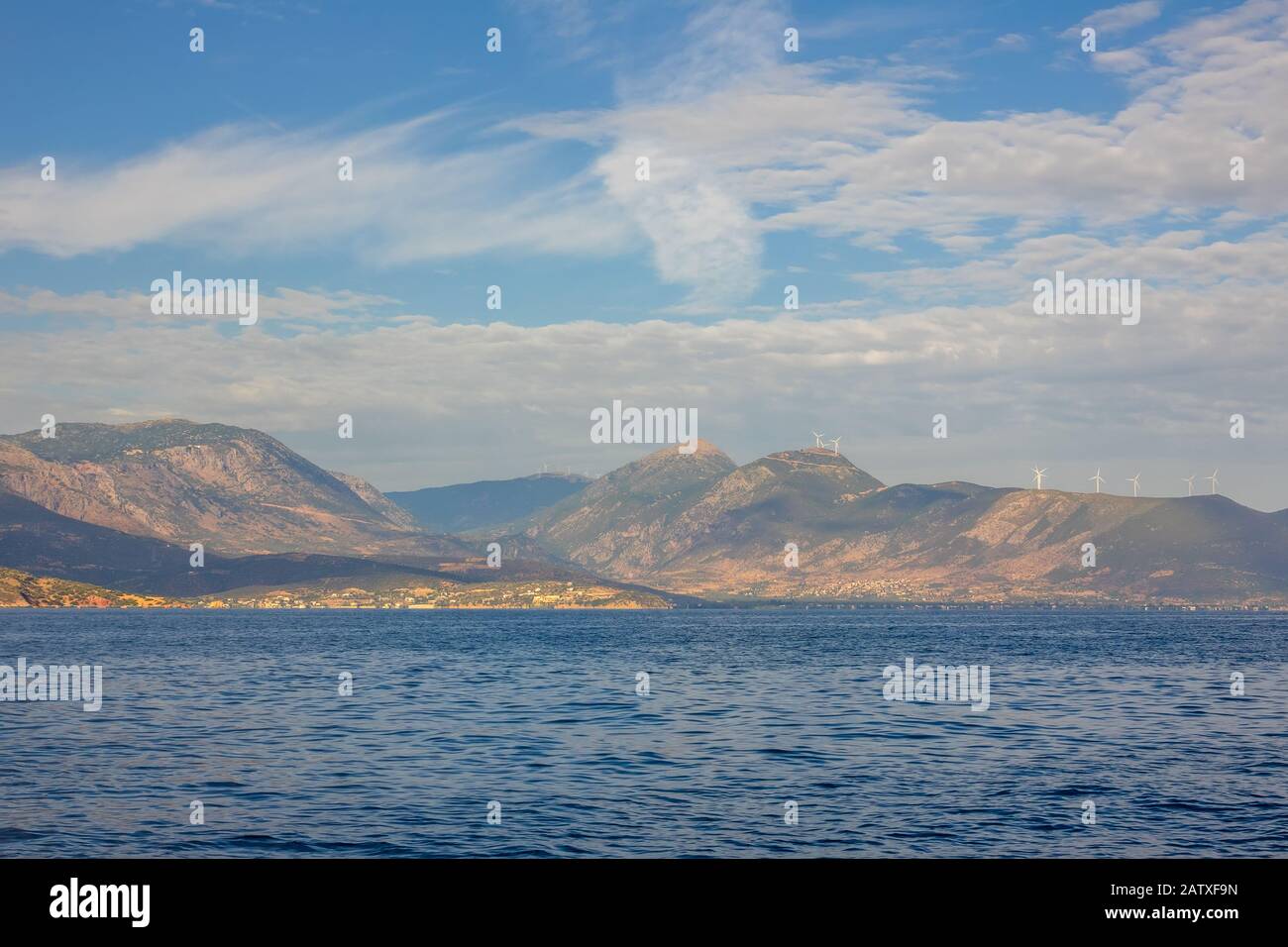 Greece. Many wind farms on hilltops. Sunny Coast of the Gulf of Corinth ...