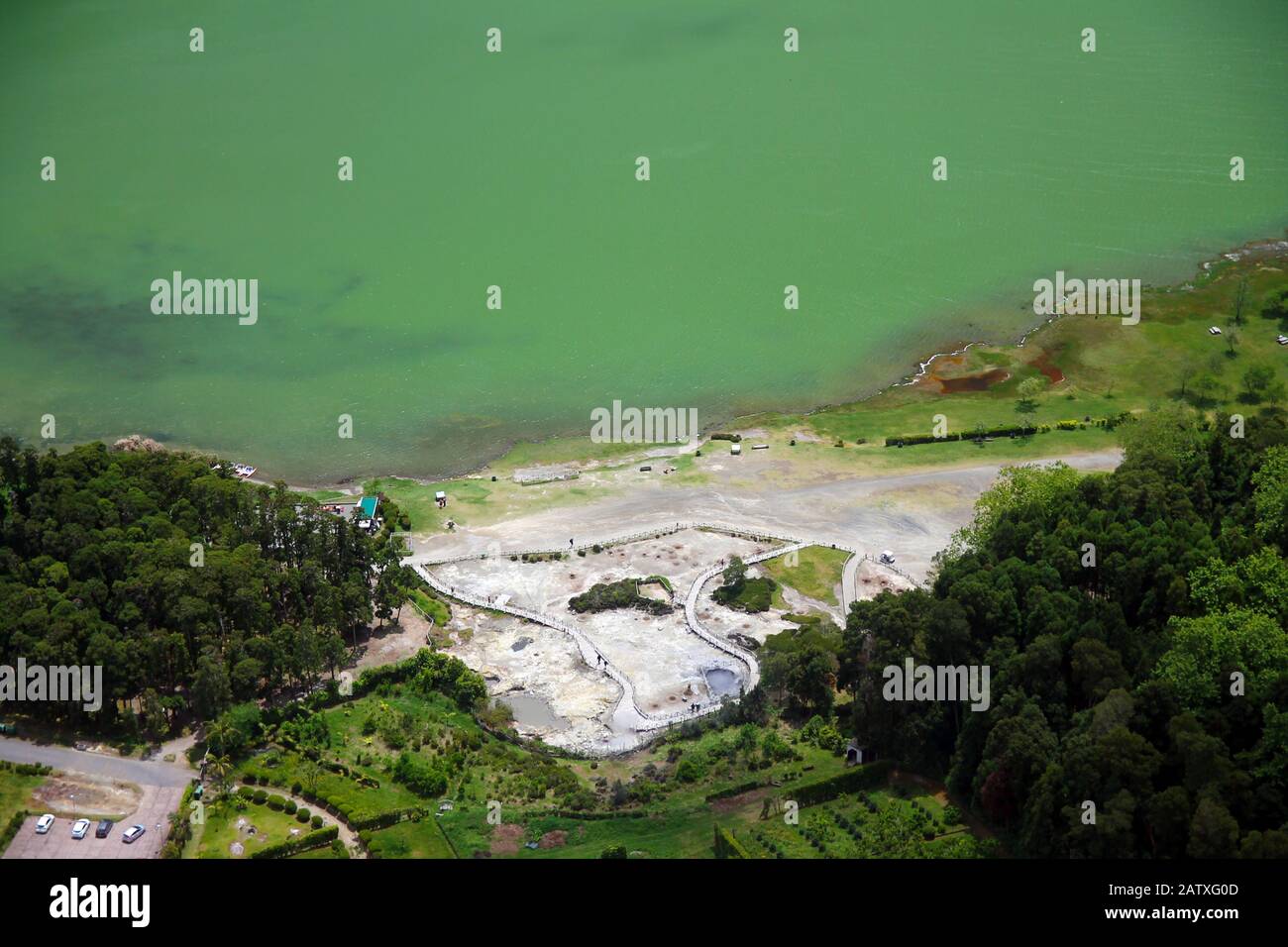 The emerald lake and the white hot springs Stock Photo - Alamy