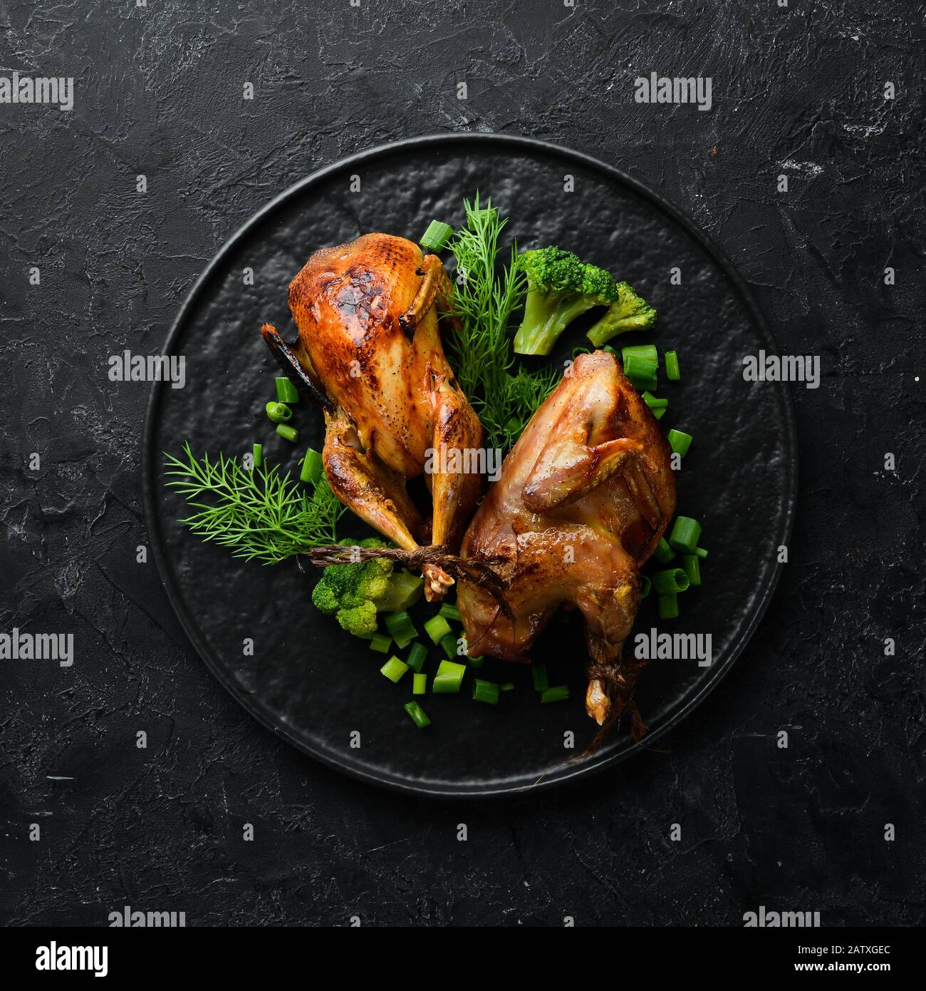Baked quail with vegetables. Flat lay. Top view. Free copy space Stock ...