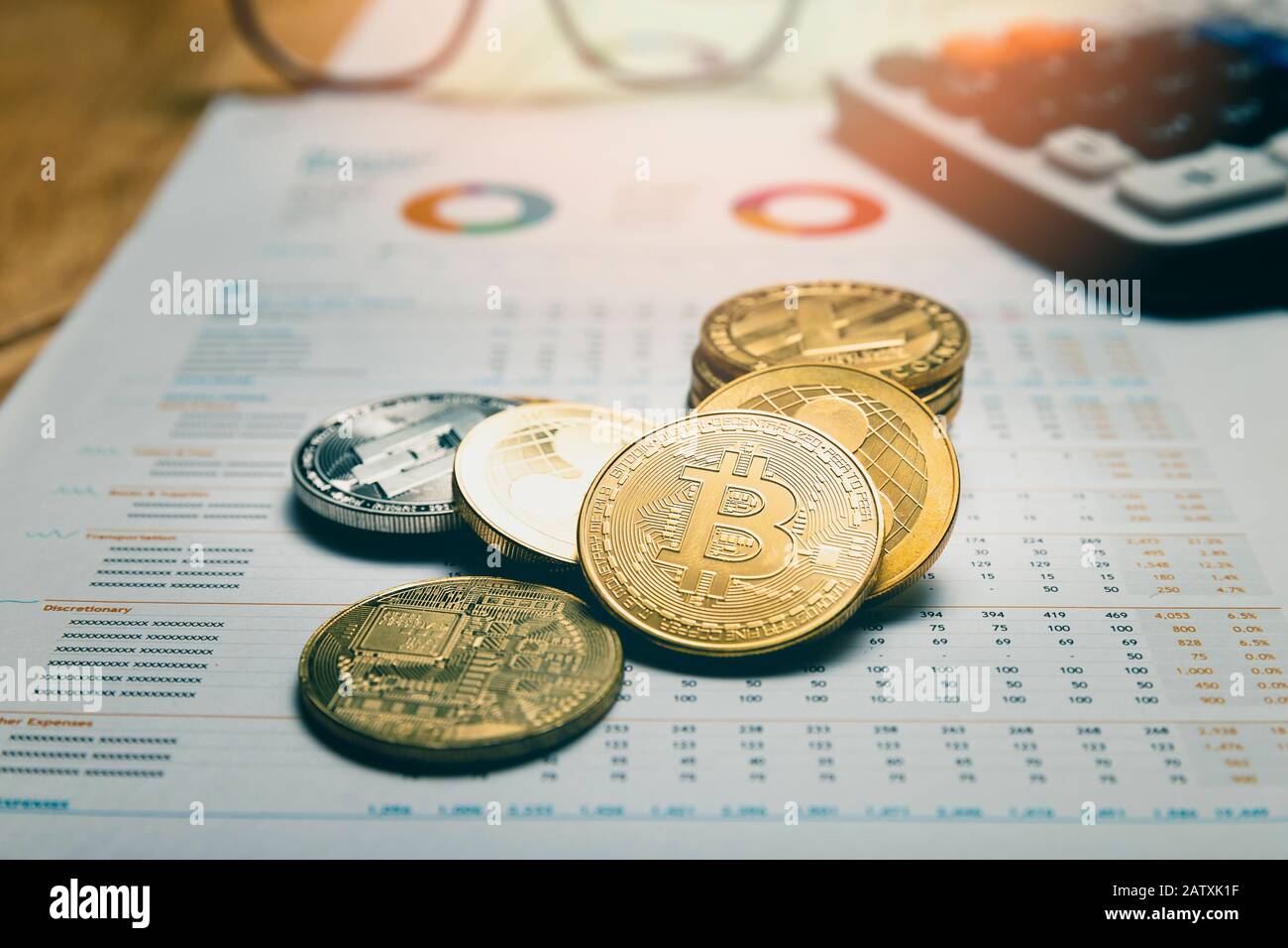 Stack of Various golden and silver of Cryptocurrency on chart or graph ...