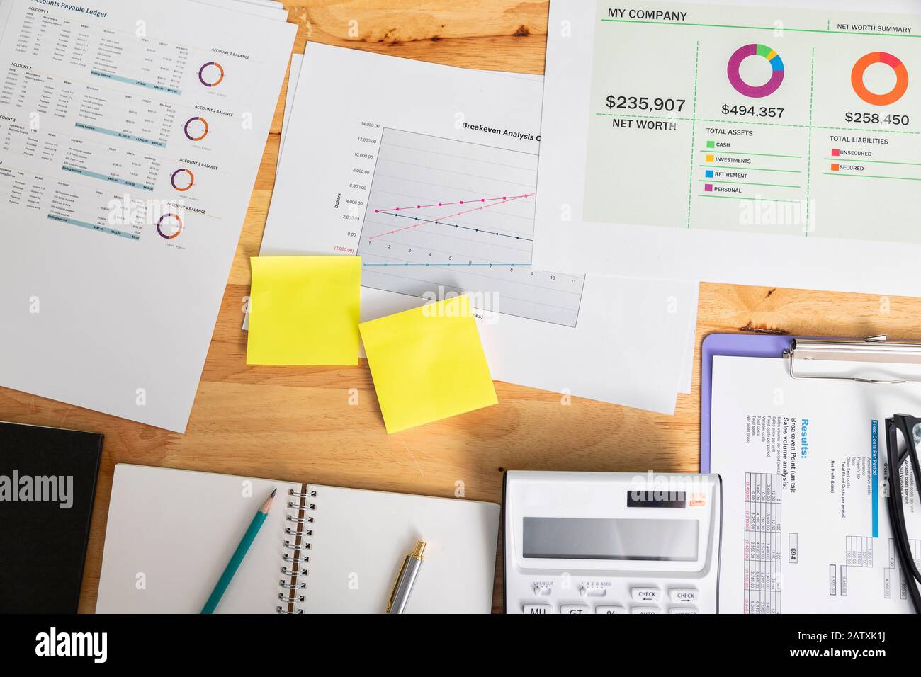 Top view of business charts or graphs on desk Stock Photo - Alamy