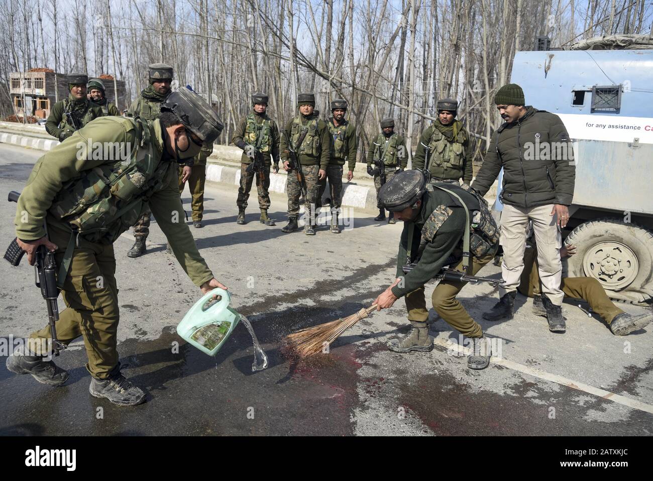 Srinagar, India. 05th Feb, 2020. Indian forces clean blood after a ...