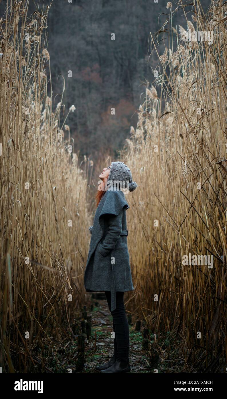 Girl in the forest of the reed Stock Photo - Alamy
