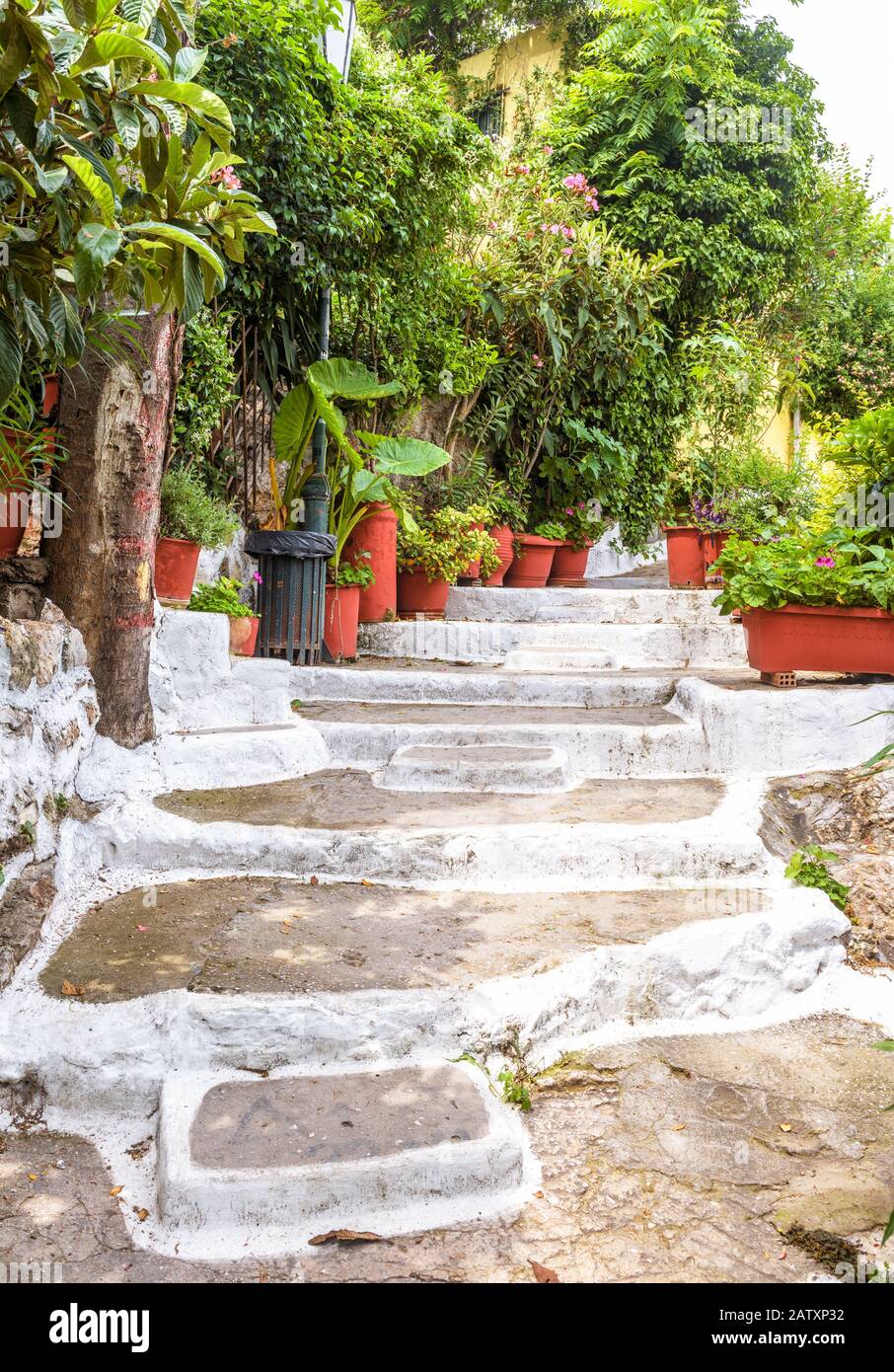 Scenic narrow street in Plaka district, Athens, Greece. Plaka is one of ...