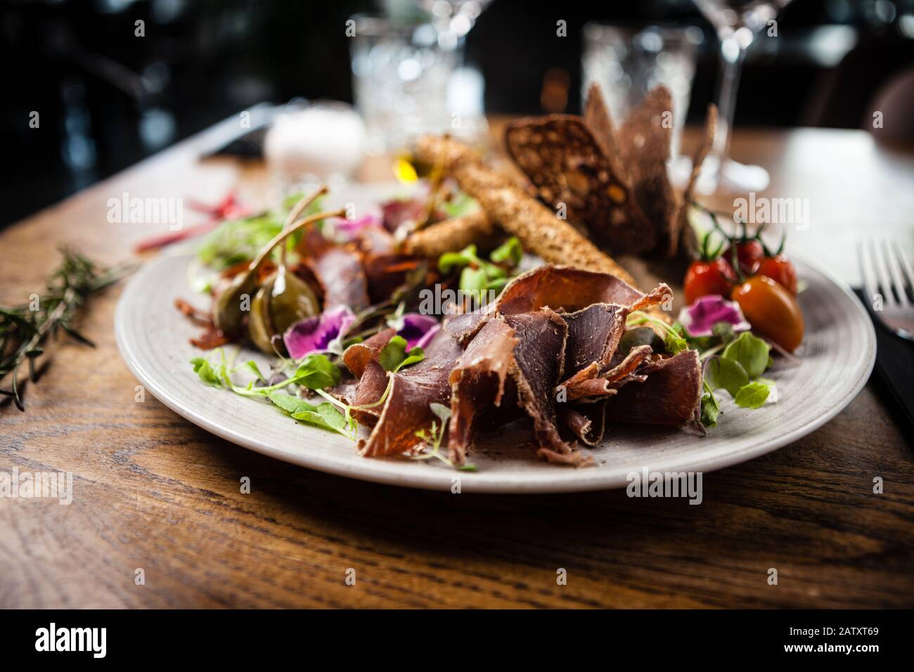Meat platter for two served on a plate in restaurant Stock Photo - Alamy