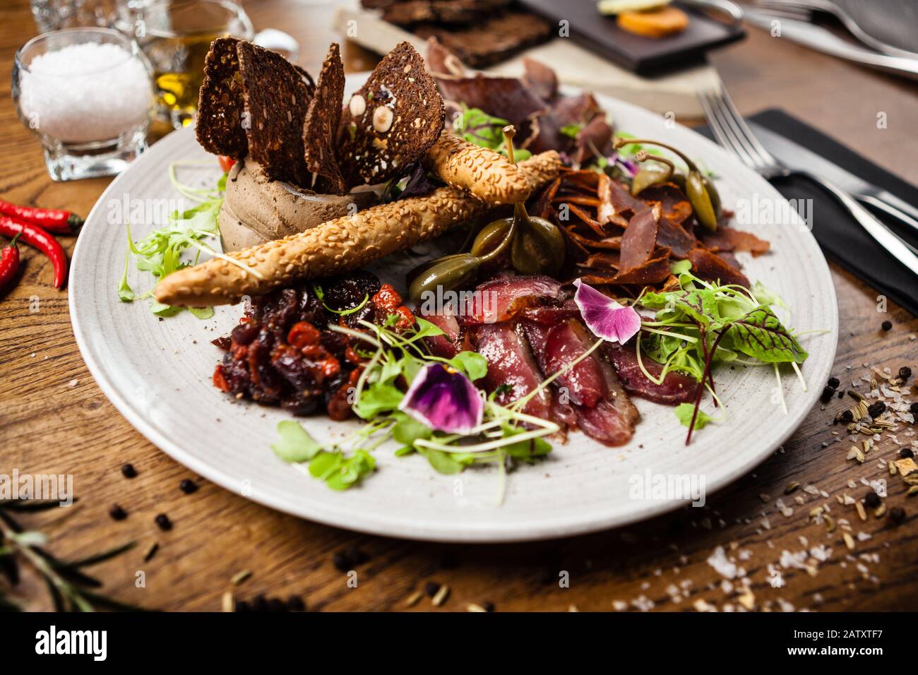 Meat platter for two served on a plate in restaurant Stock Photo - Alamy