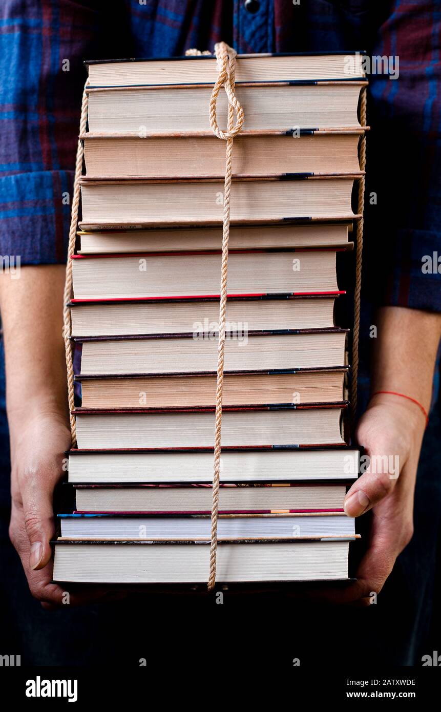 Books tied with a rope hi-res stock photography and images - Alamy