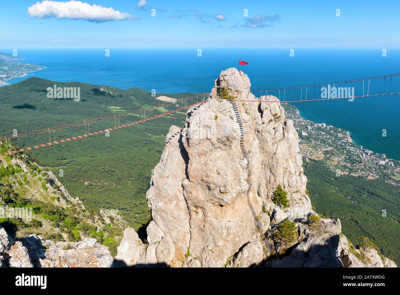 The rock with a rope bridge on the Mount Ai-Petri. Ai-Petri is one of ...