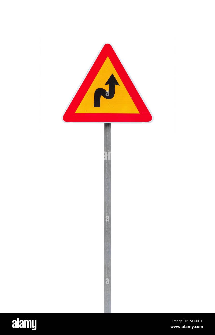 Dangerous turns, yellow triangle warning traffic sign on a metal pole ...