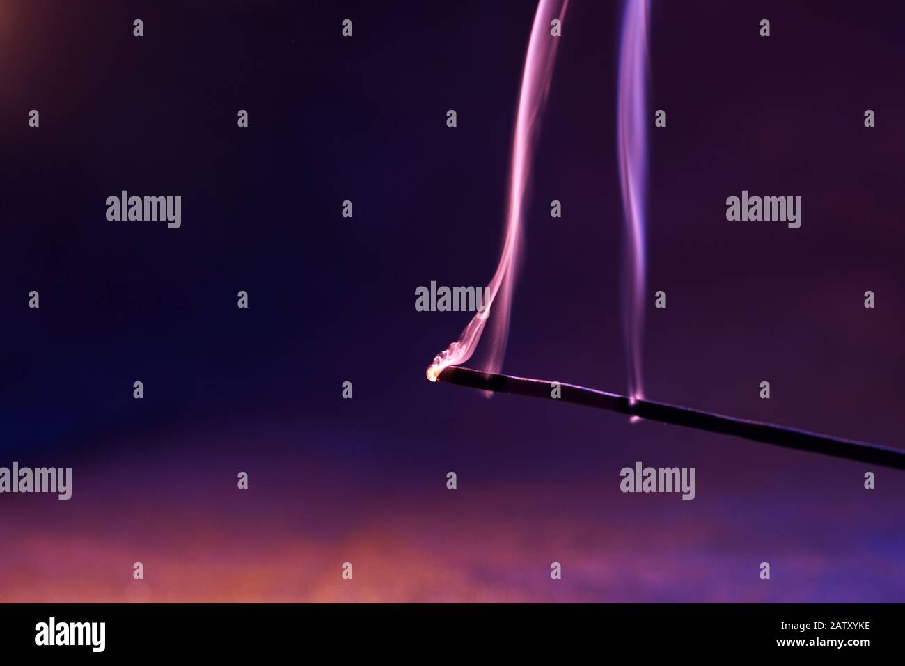 Lit matches and blown out in the studio photographed with colorful ...