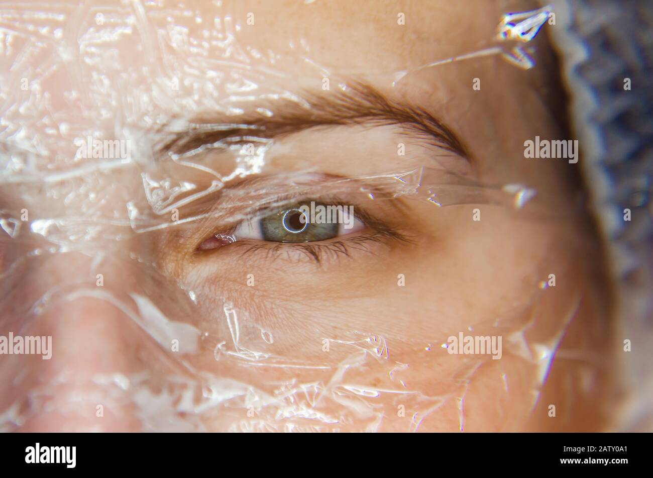 Plastic wrap face hi-res stock photography and images - Alamy
