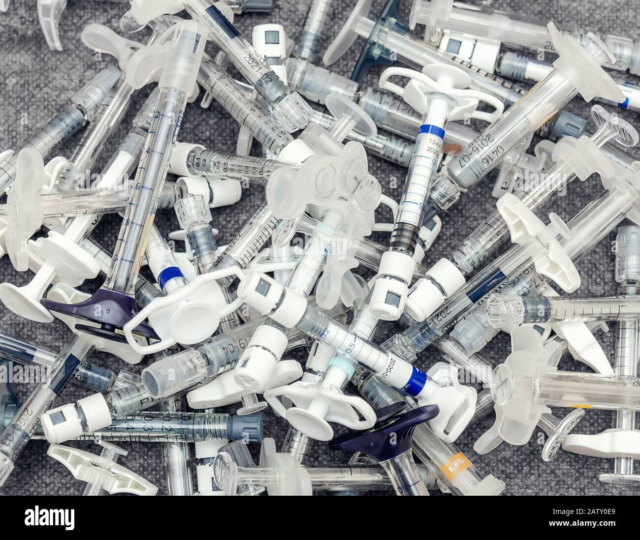 Cosmetic injection syringes piled up Stock Photo - Alamy