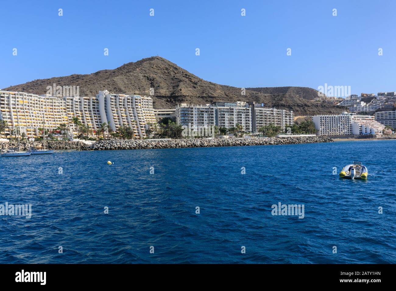 Hotel Radisson Blue and apartment buildings in Anfi del Mar seen from ...