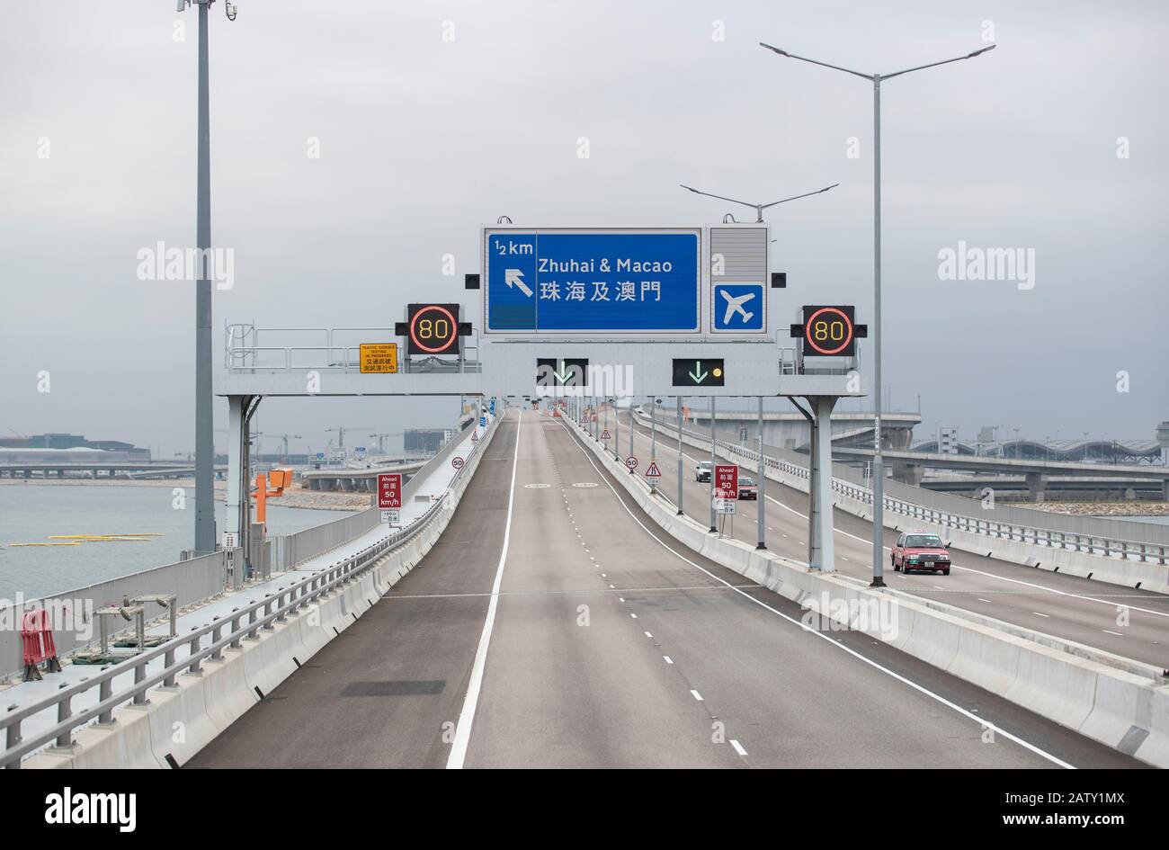 A road sign of Zhuhai, Macao direction seen on the way to Hong Kong ...