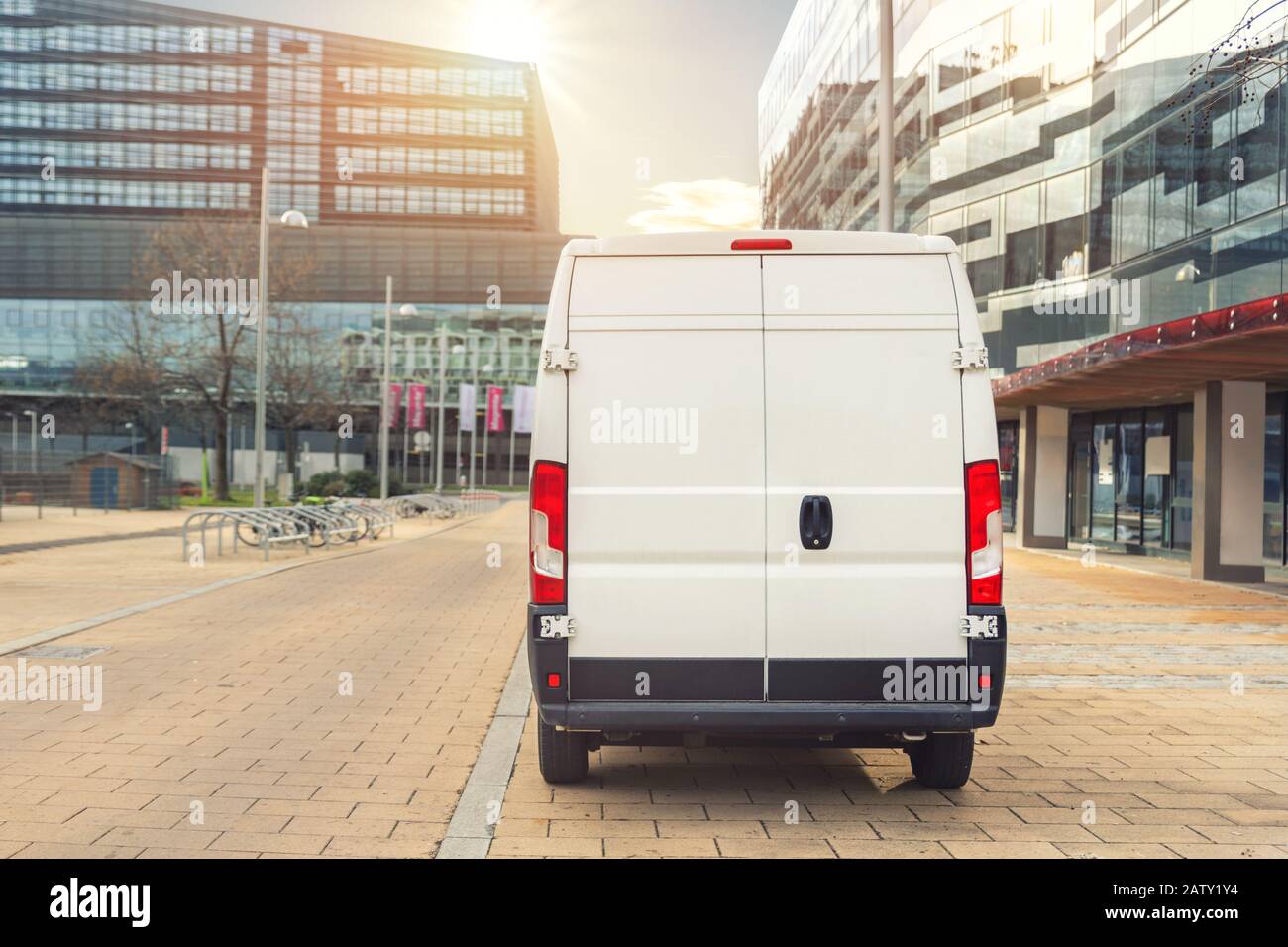 Unrecognizable altered delivery van in european city central . Medium ...