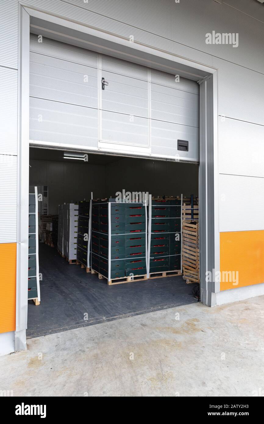 Cargo Door at Distribution Warehouse Loading Dock Stock Photo - Alamy