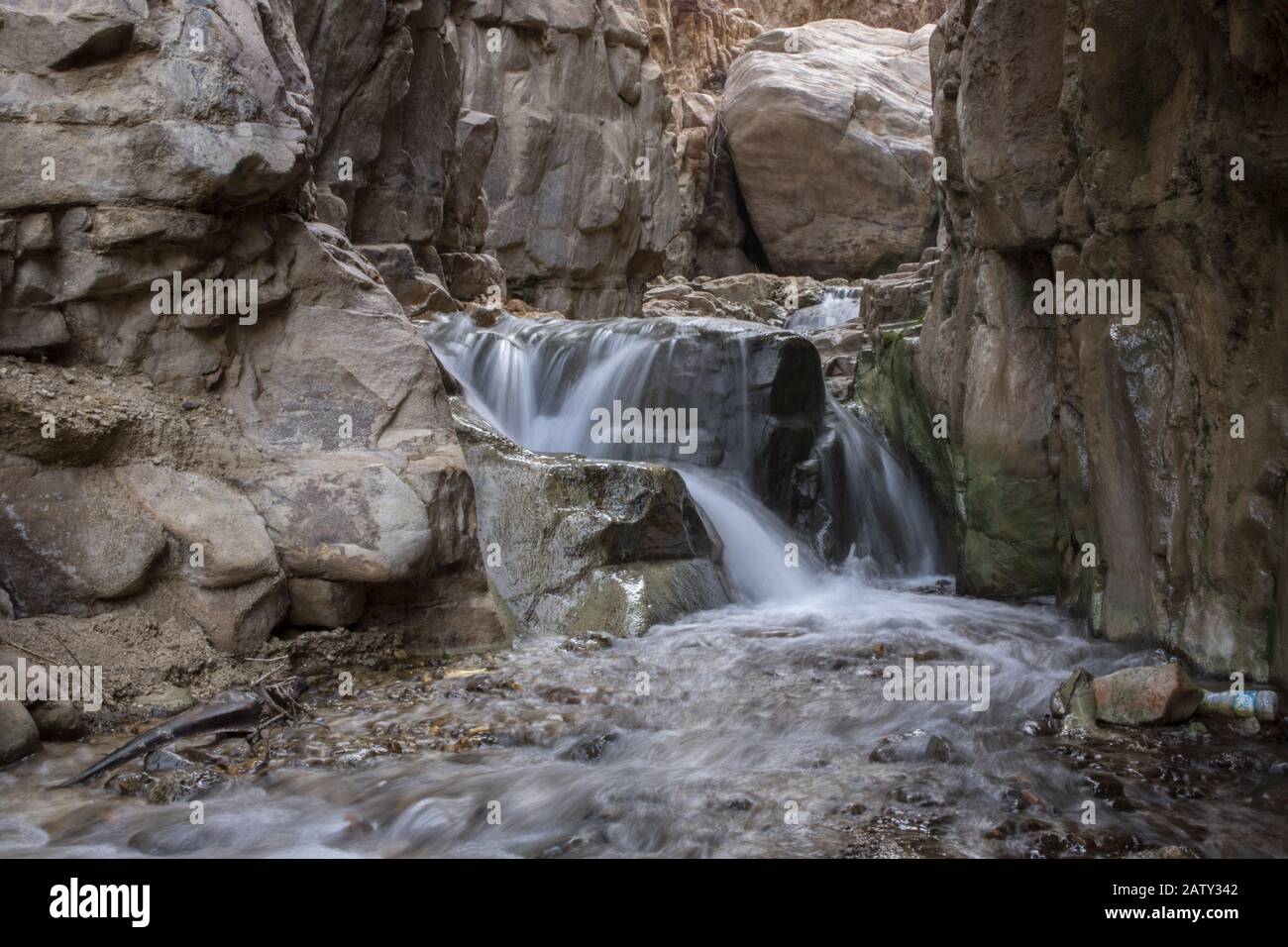 The waterfall and running river across the sandstone rocks Stock Photo ...