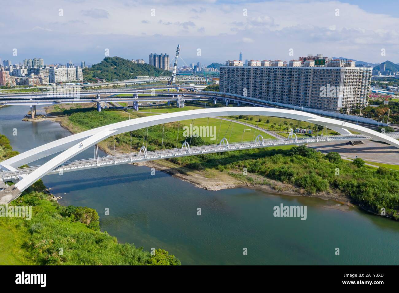 Aerial sunny view of the Sunshine Bridge with cityscape of Xindian ...