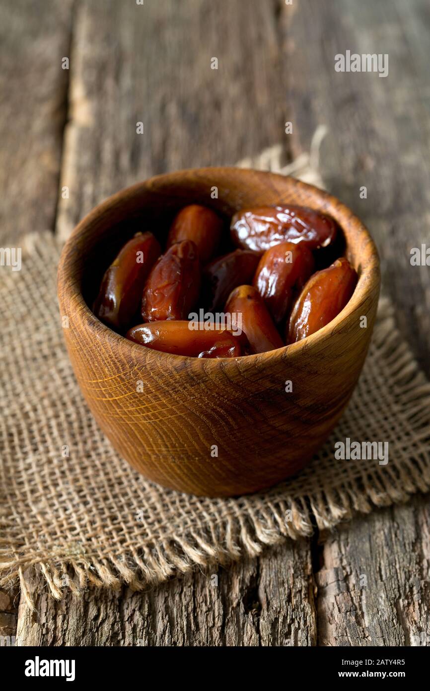 dried dates on wood Stock Photo - Alamy