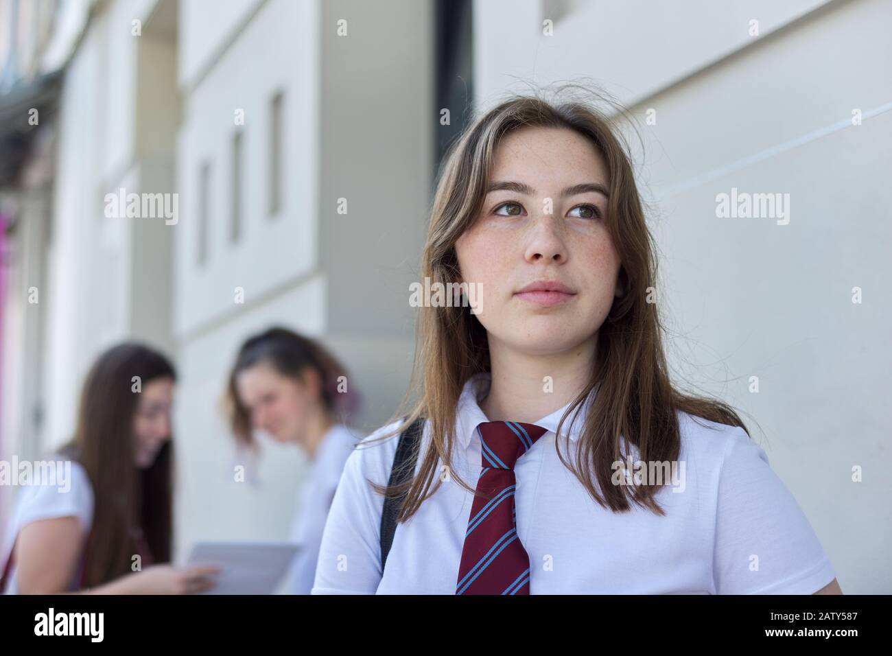 Closeup outdoor portrait of teenage student of 17 years old. Smiling ...
