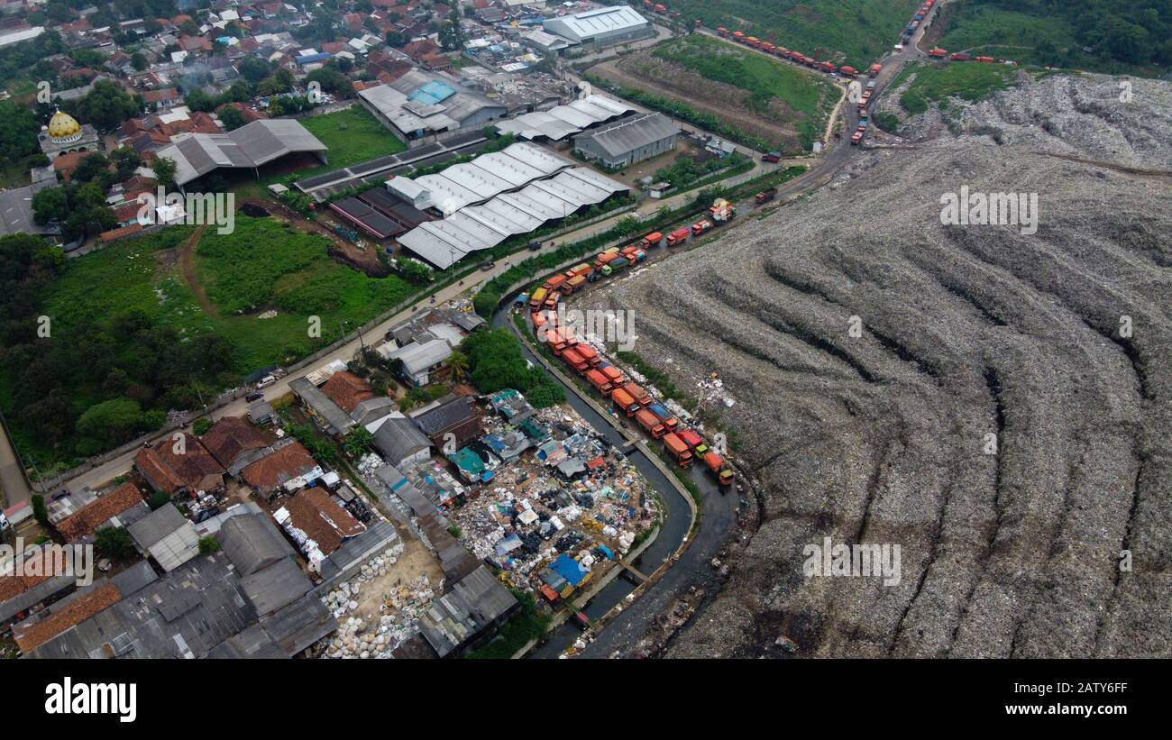 Aerial View. Large landfills like mountains. the tractor take garbage ...
