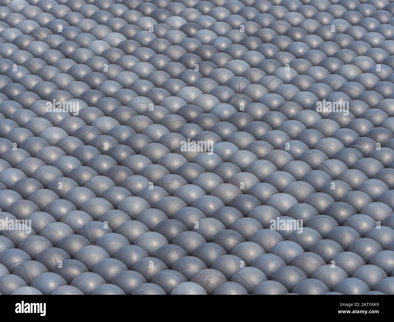 Background, Texture. Fire water tank covered with gray balls. Water ...