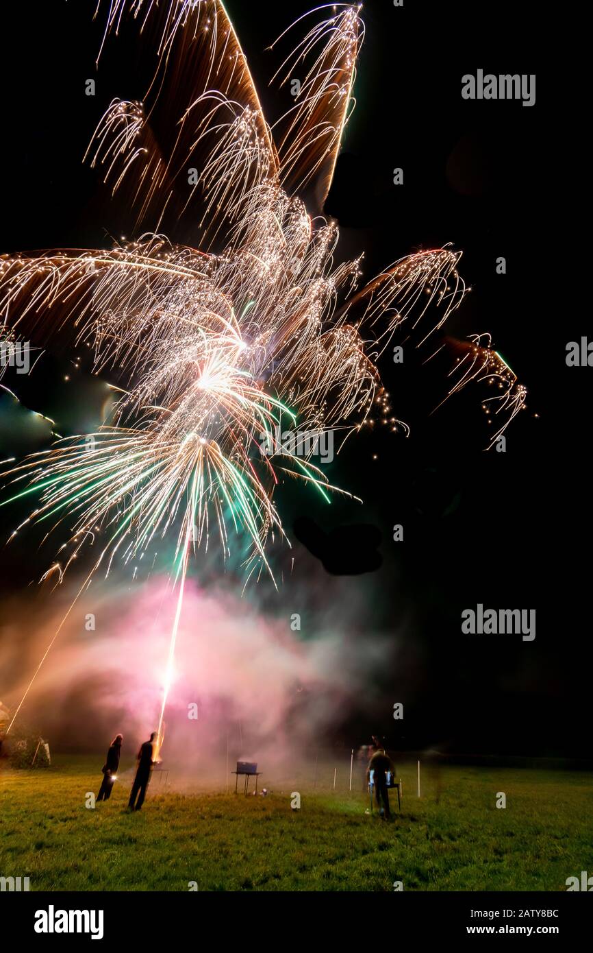 Long exosure of people letting off fireworks Stock Photo - Alamy