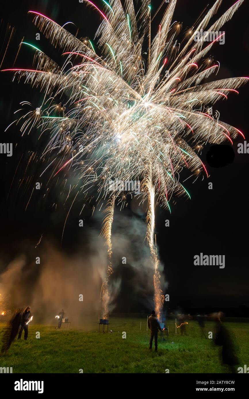 Long exosure of people letting off fireworks Stock Photo - Alamy