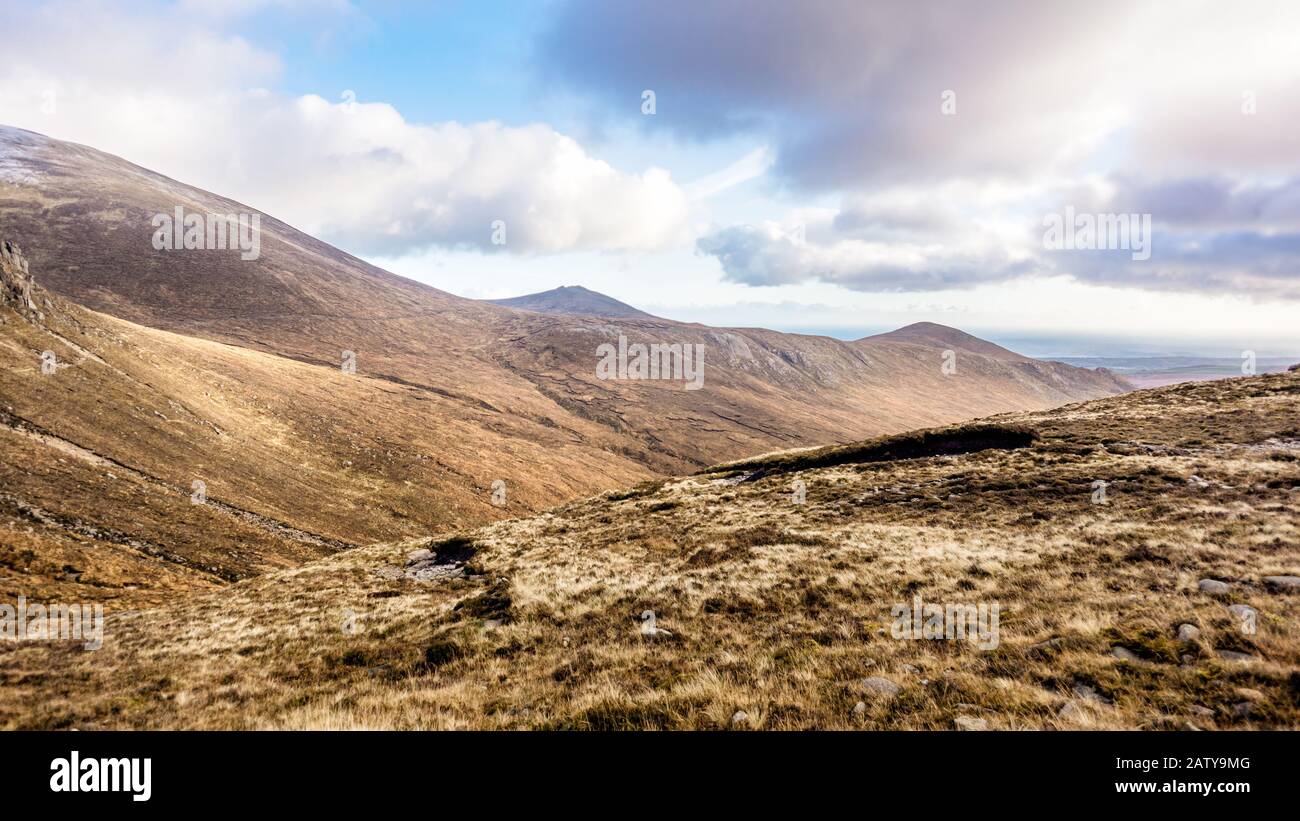 Beautiful valley in Mourn Mountains at autumn colours. Dramatic cloudy ...