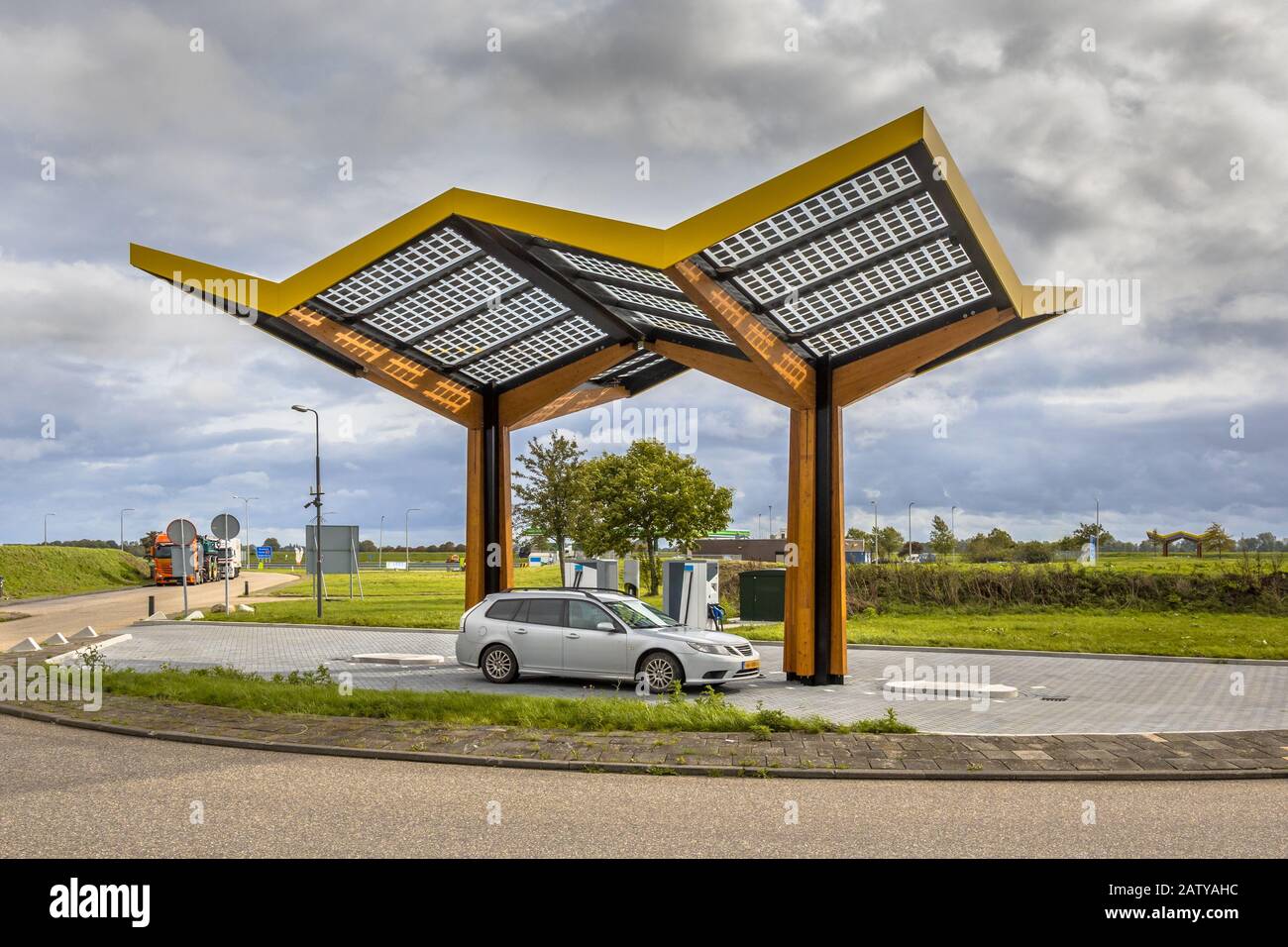 Electric car filling at electricity charge station in the fast ...