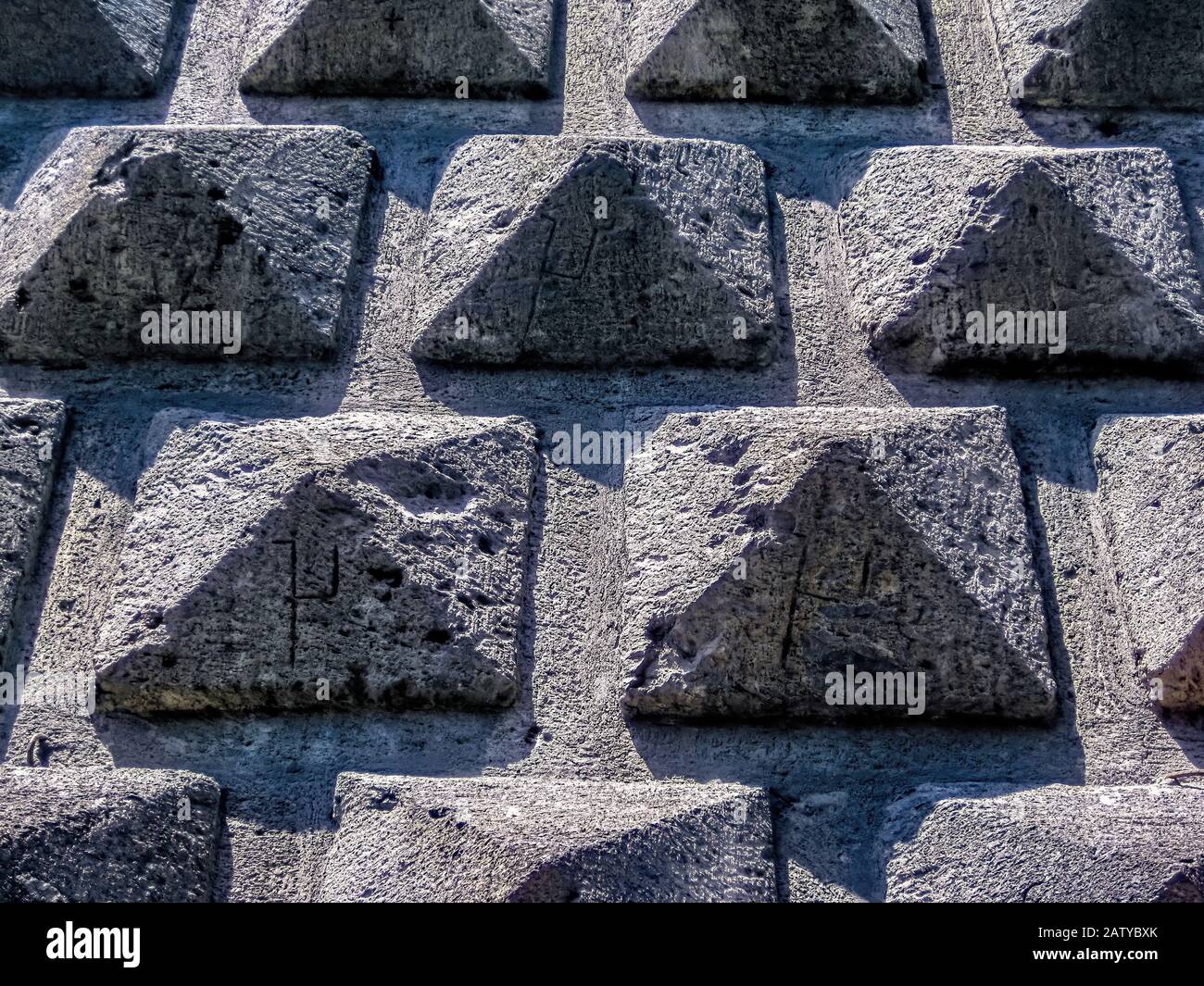 Facade of the Gesù Nuovo church with symbols, Naples, Italy Stock Photo ...