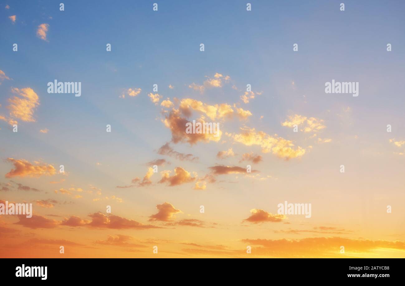 Sunset sunrise with clouds, light rays and other atmospheric effect ...