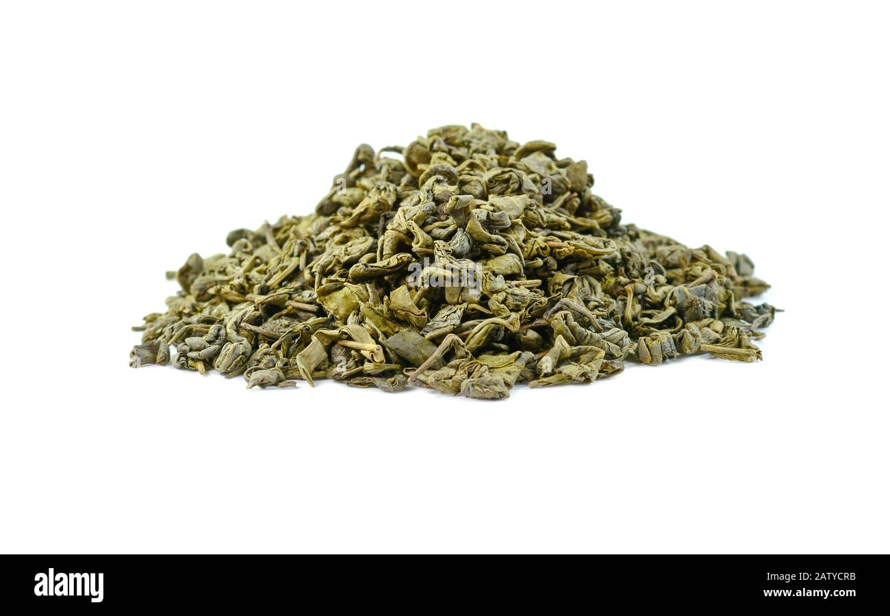 Dry green tea isolated on white background Stock Photo - Alamy