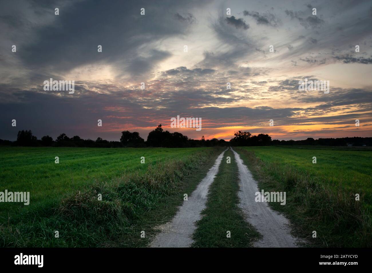 Empty dirt road light sunset hi-res stock photography and images - Alamy